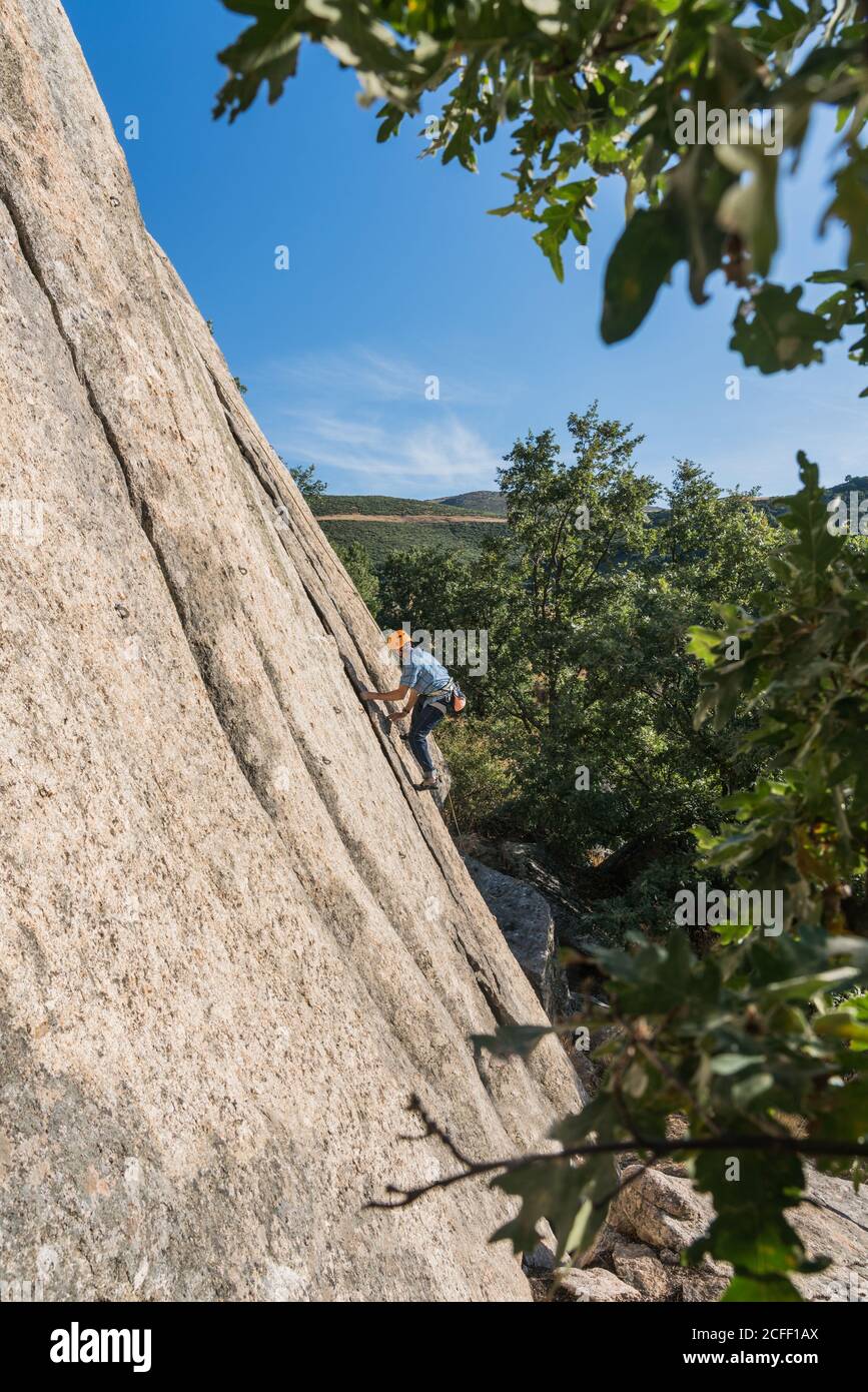 Top view of free climber climbing in nature Stock Photo - Alamy