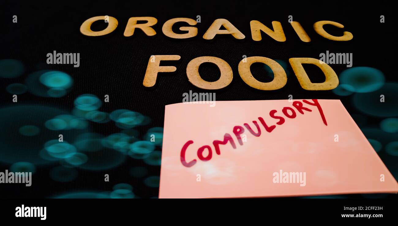 Organic food compulsory word displayed on black board for learning and ...