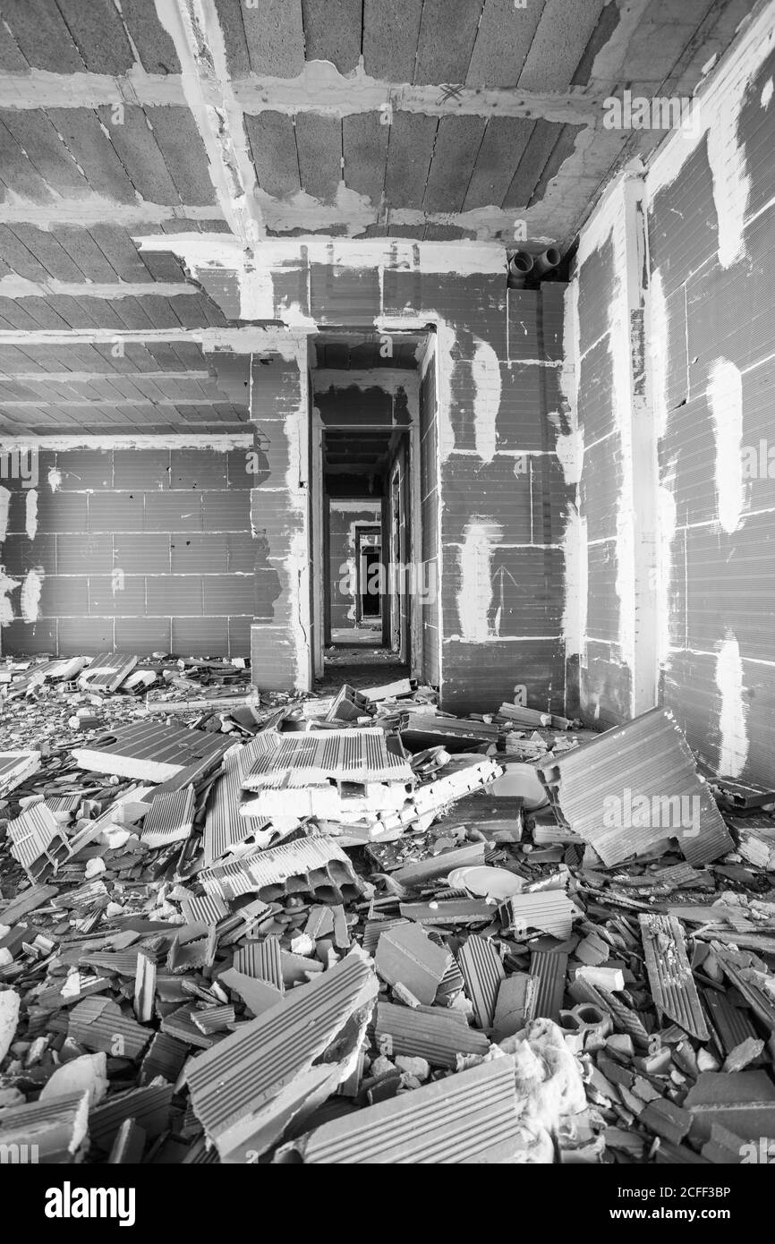 Heap of broken panels placed in building under construction Stock Photo ...
