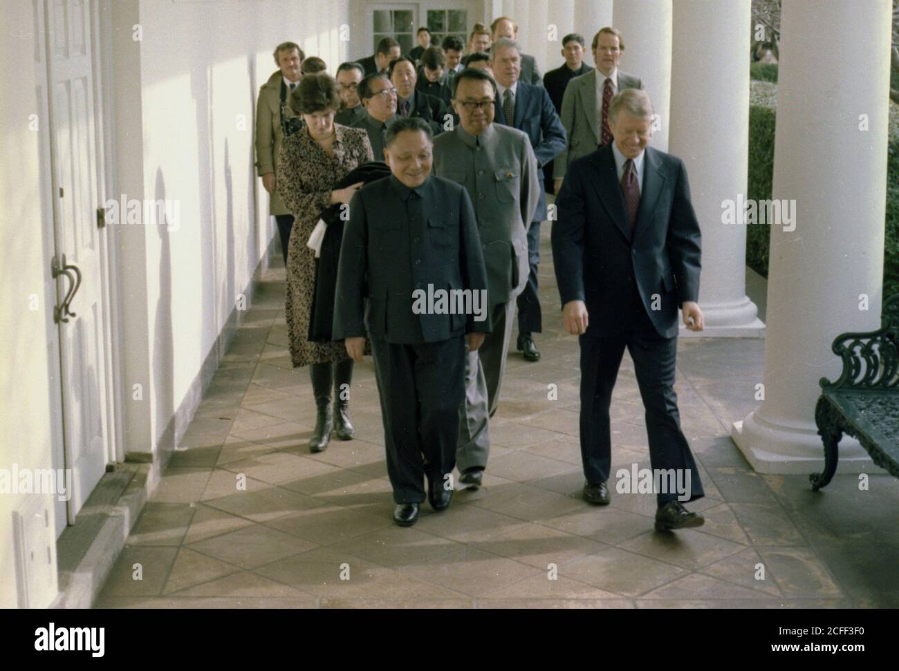 Deng Xiaoping and Jimmy Carter make their way to the Oval Office. ca ...