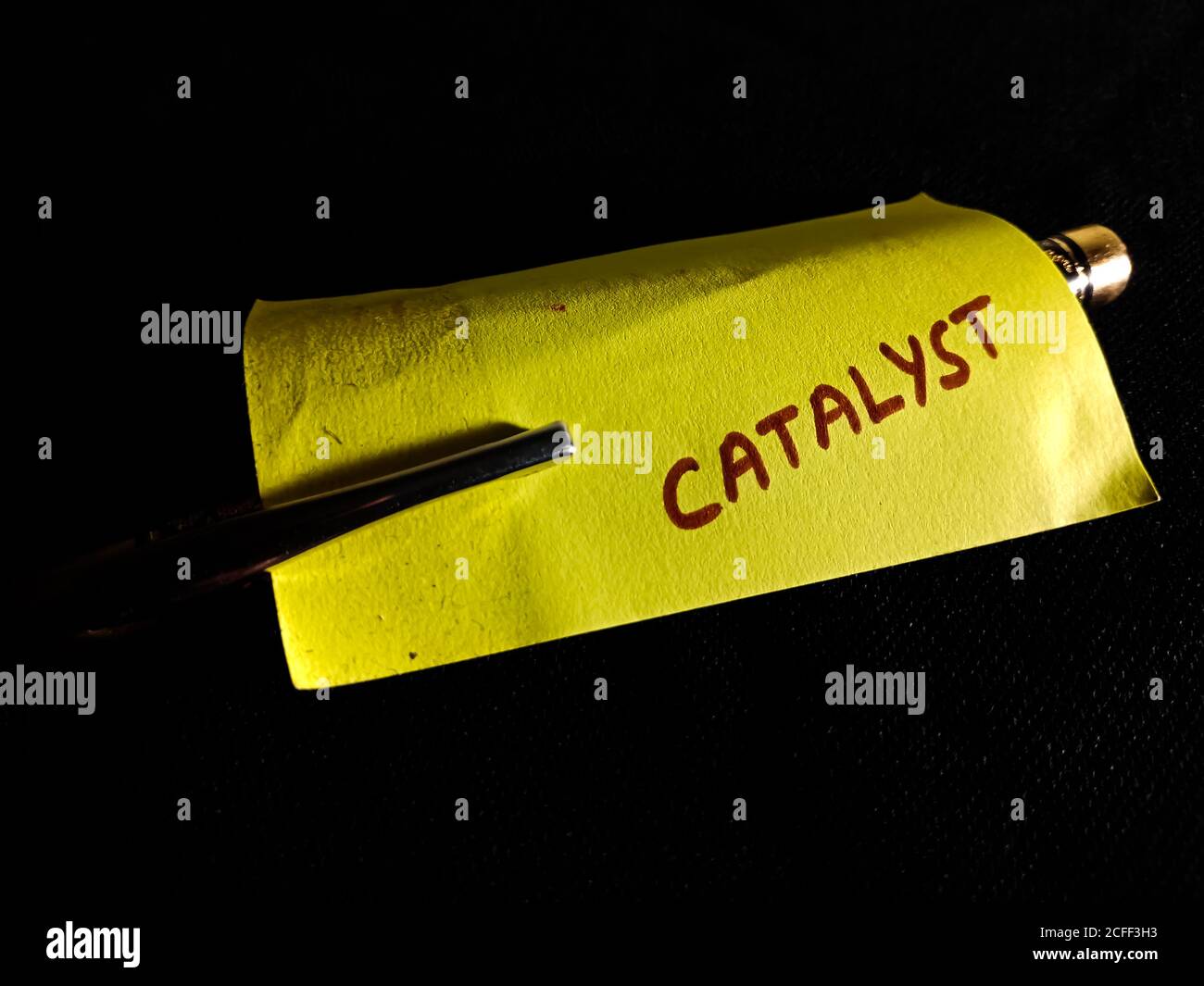 Catalyst word displayed on paper slip concept for educational ...