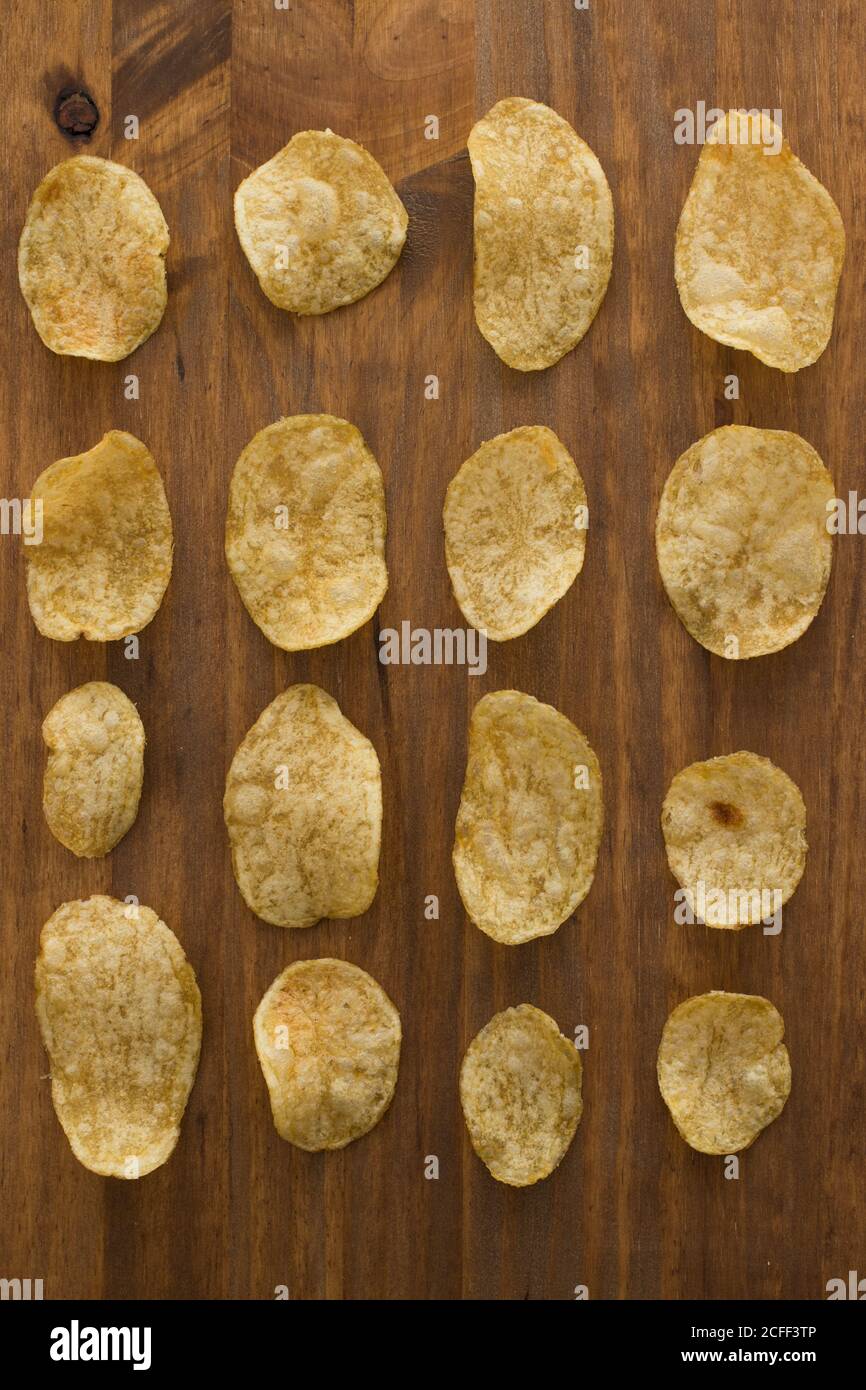 Row of potato chips hi-res stock photography and images - Alamy