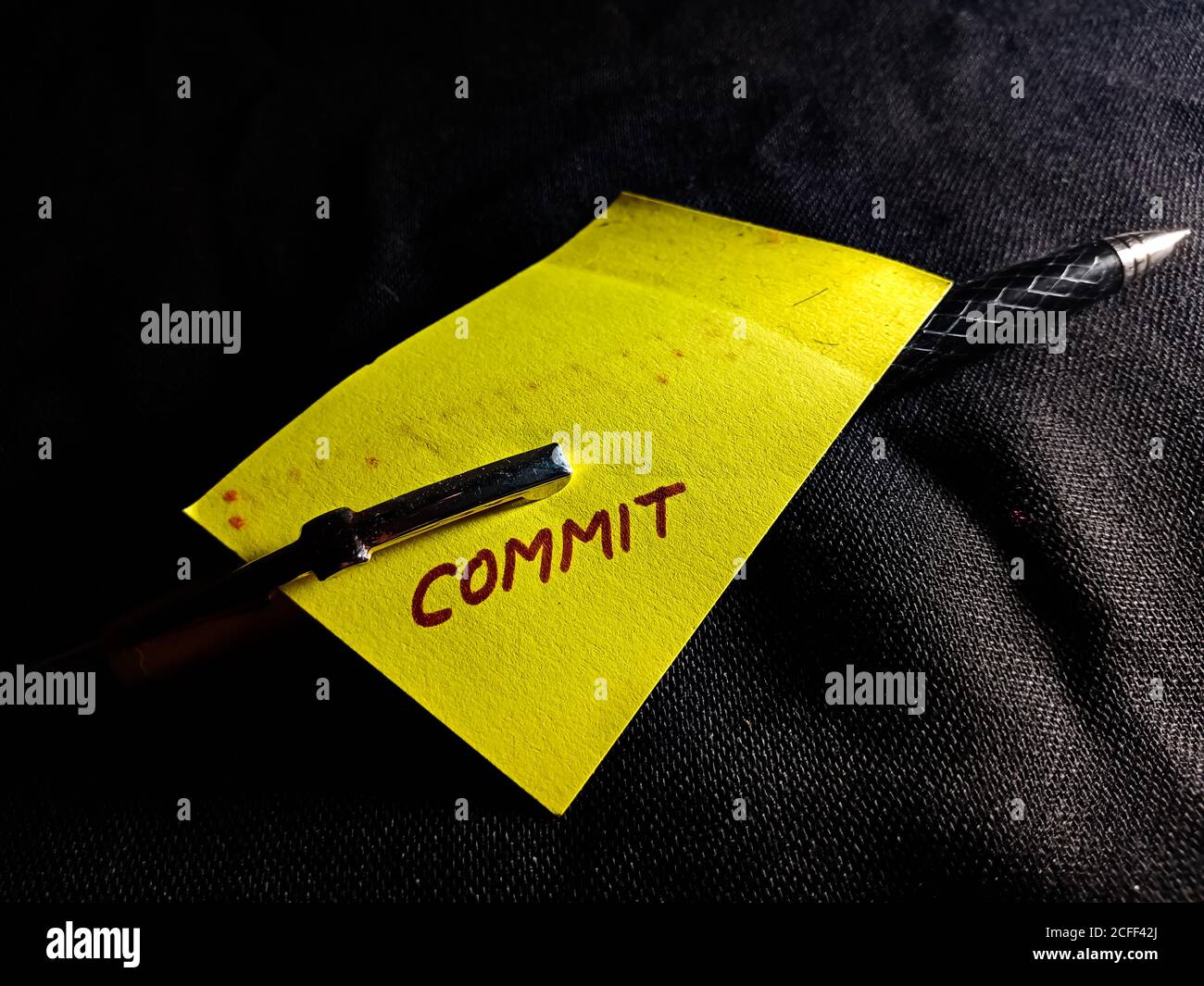 Commit word displayed on paper slip concept for educational informative ...
