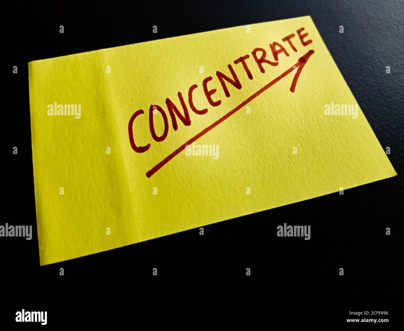Concentrate word displayed on paper slip concept for educational ...