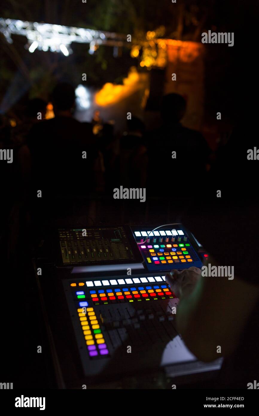 Soundboard mixer in a live event at night Stock Photo - Alamy