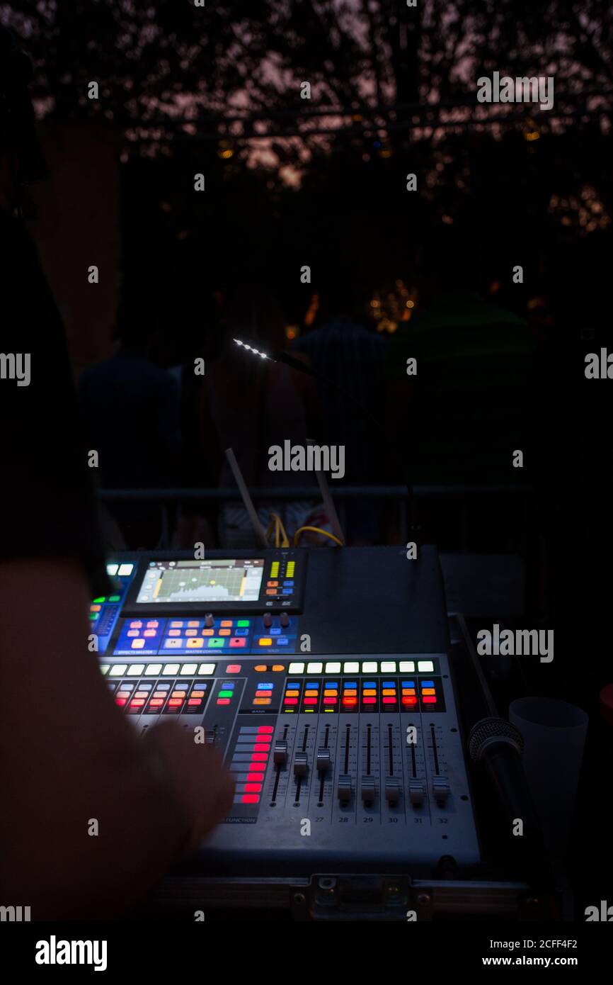Soundboard mixer in a live event at night Stock Photo - Alamy