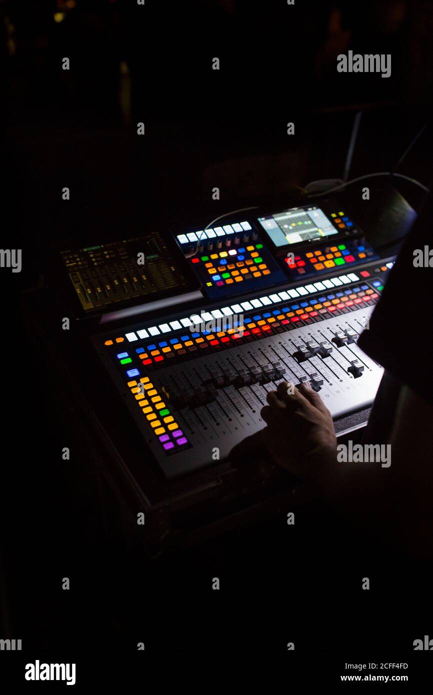 Soundboard mixer in a live event at night Stock Photo - Alamy