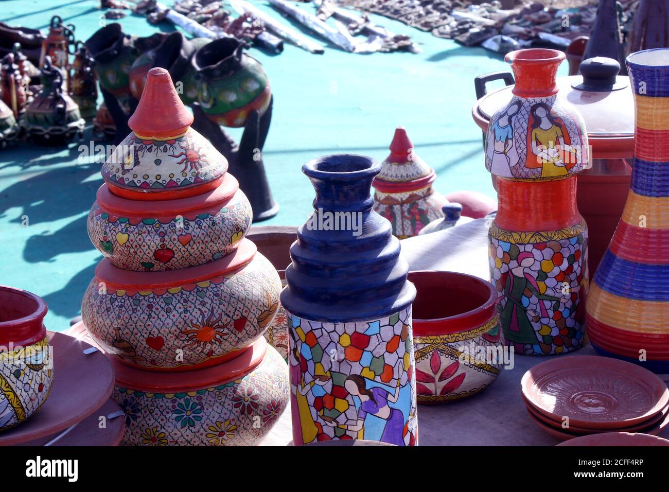 colorful crockery vase, handcrafted traditional clay pot in market ...