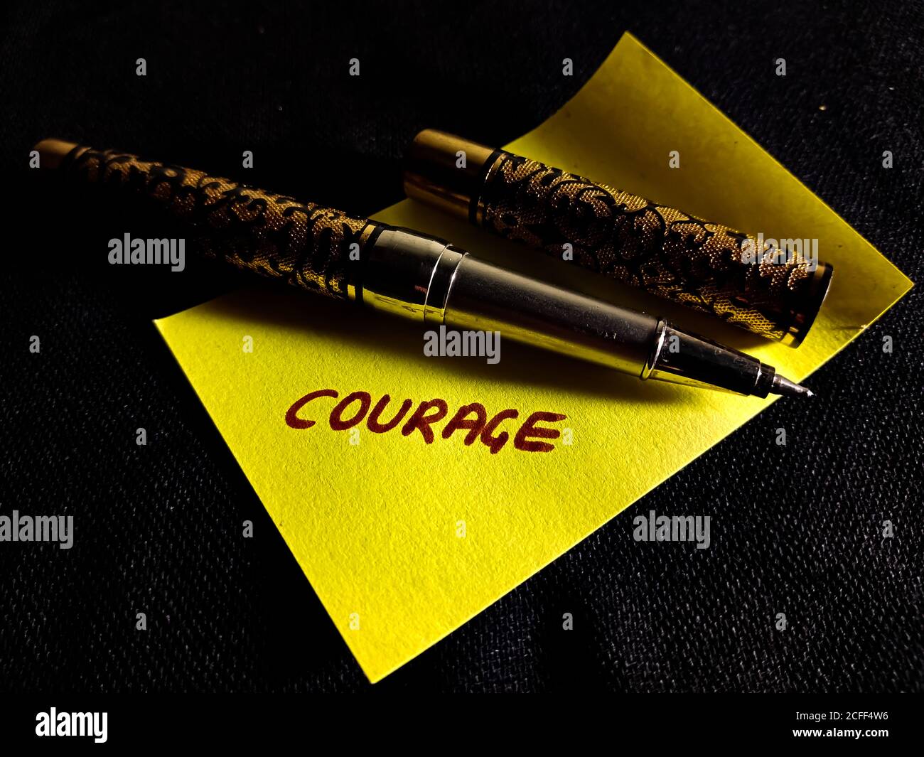 Courage word displayed on paper slip concept for educational ...
