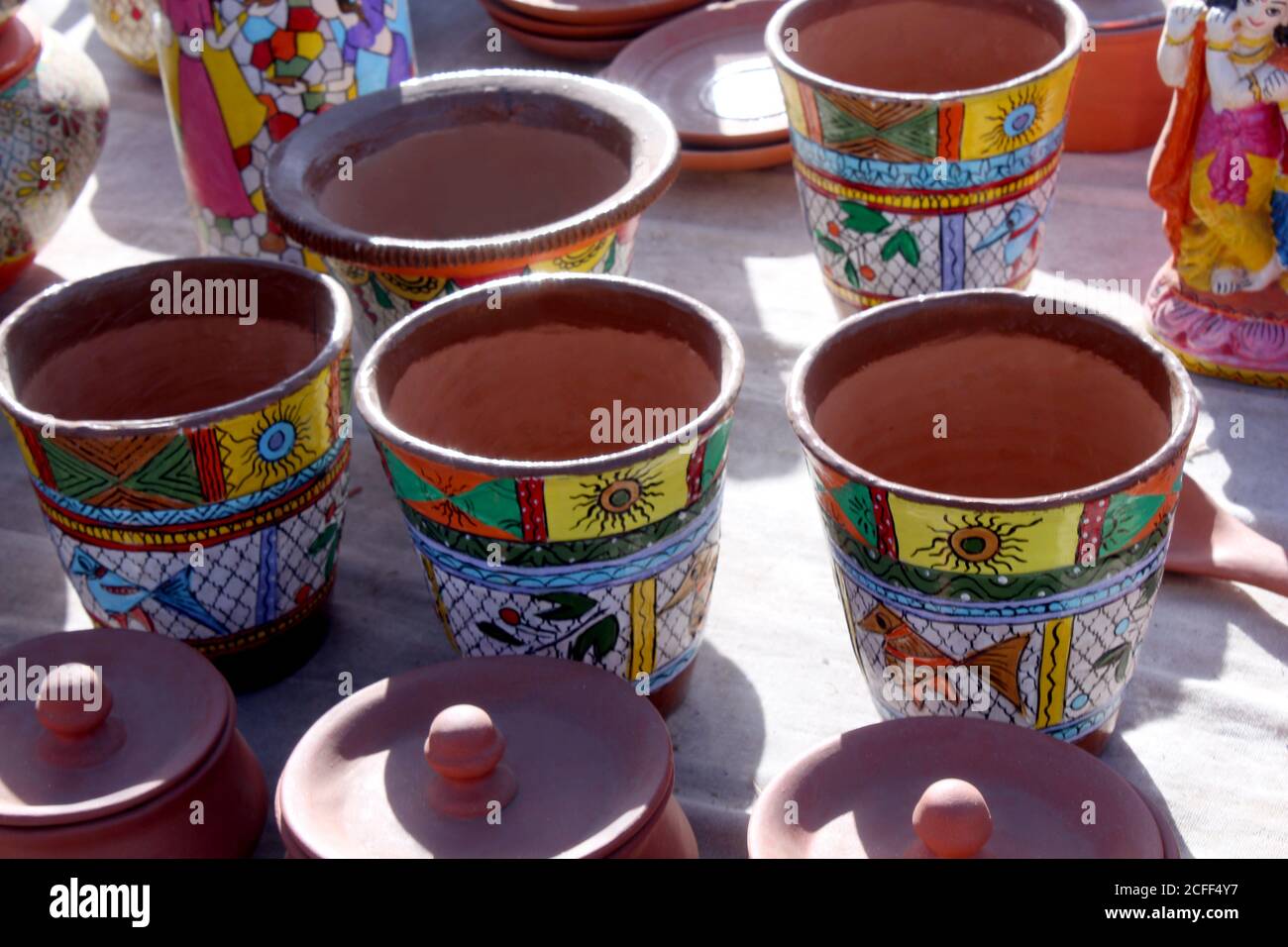 colorful crockery vase, handcrafted traditional clay pot in market ...