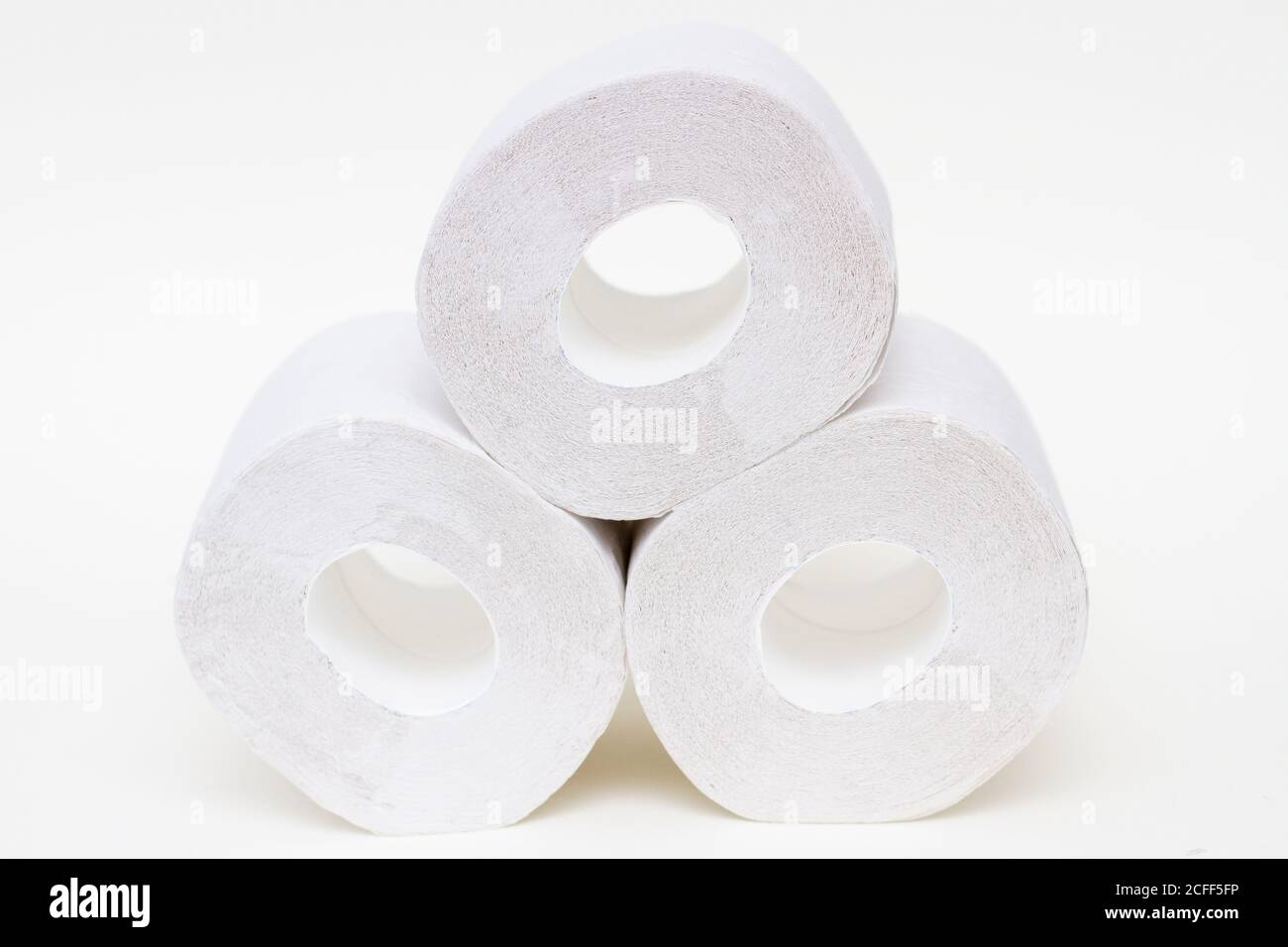 Stack of toilet paper rolls on white background Stock Photo - Alamy