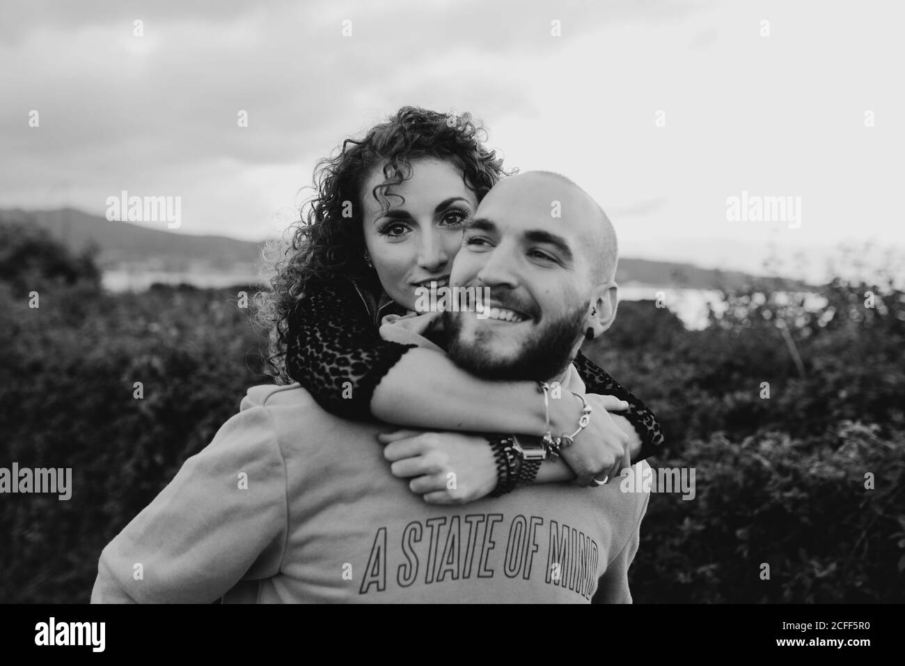 Piggyback ride Black and White Stock Photos & Images - Alamy