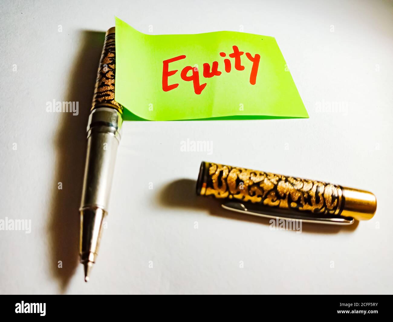 Equity word displayed on paper slip concept for educational informative ...