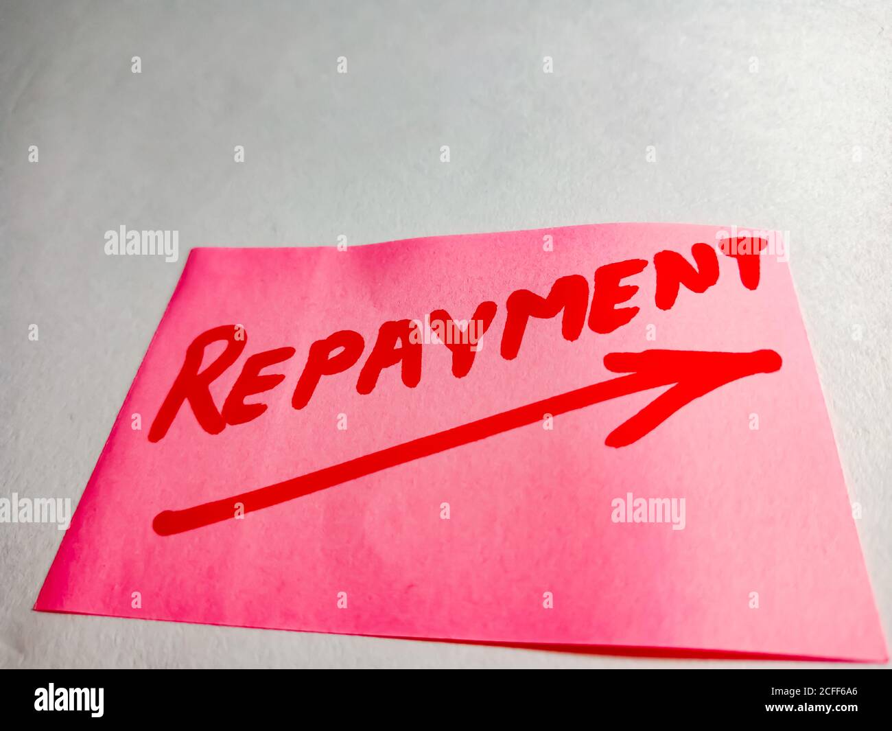 Repayment word displayed on paper slip concept for educational ...