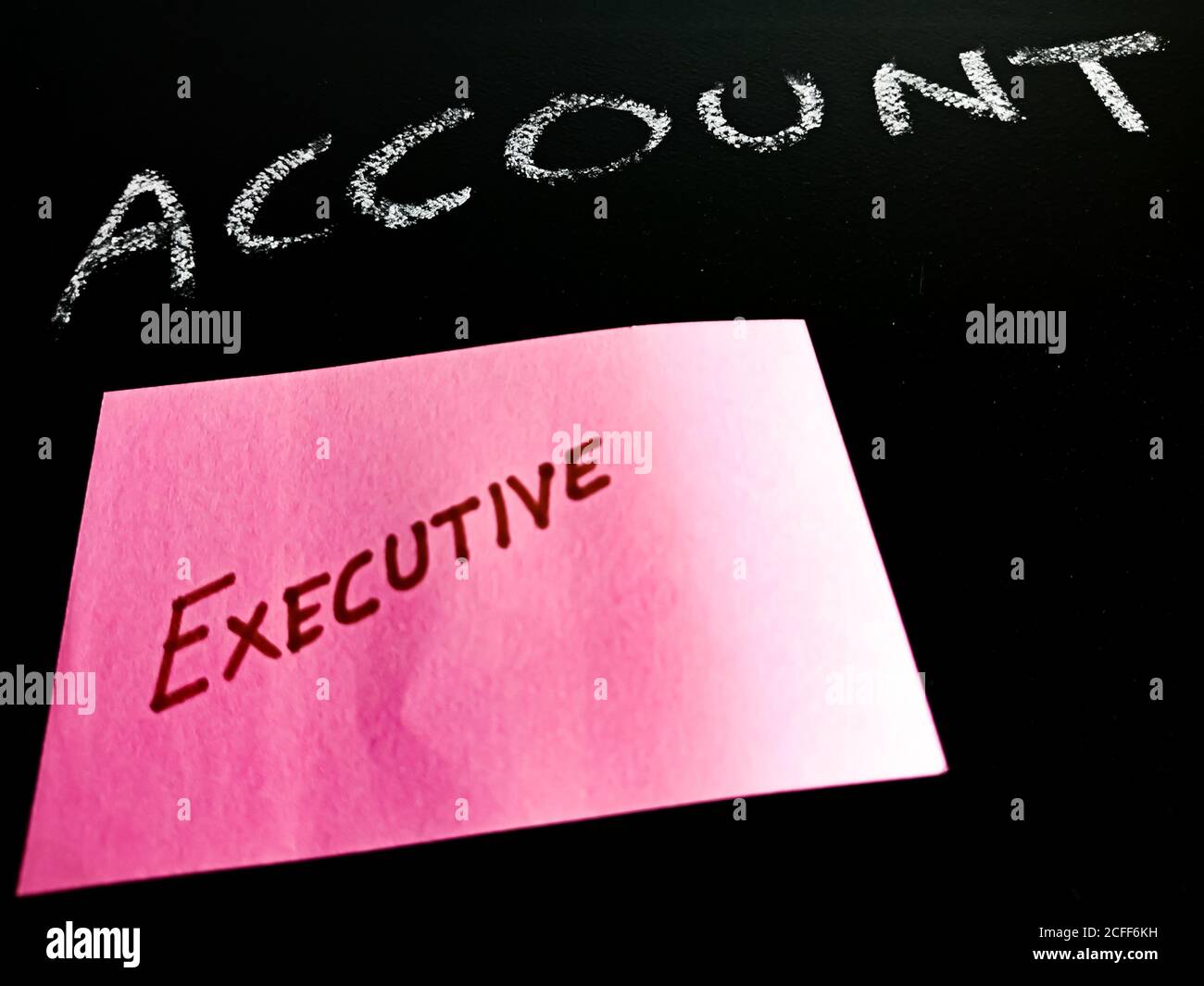Account Executive word displayed on chalkboard for learning and ...
