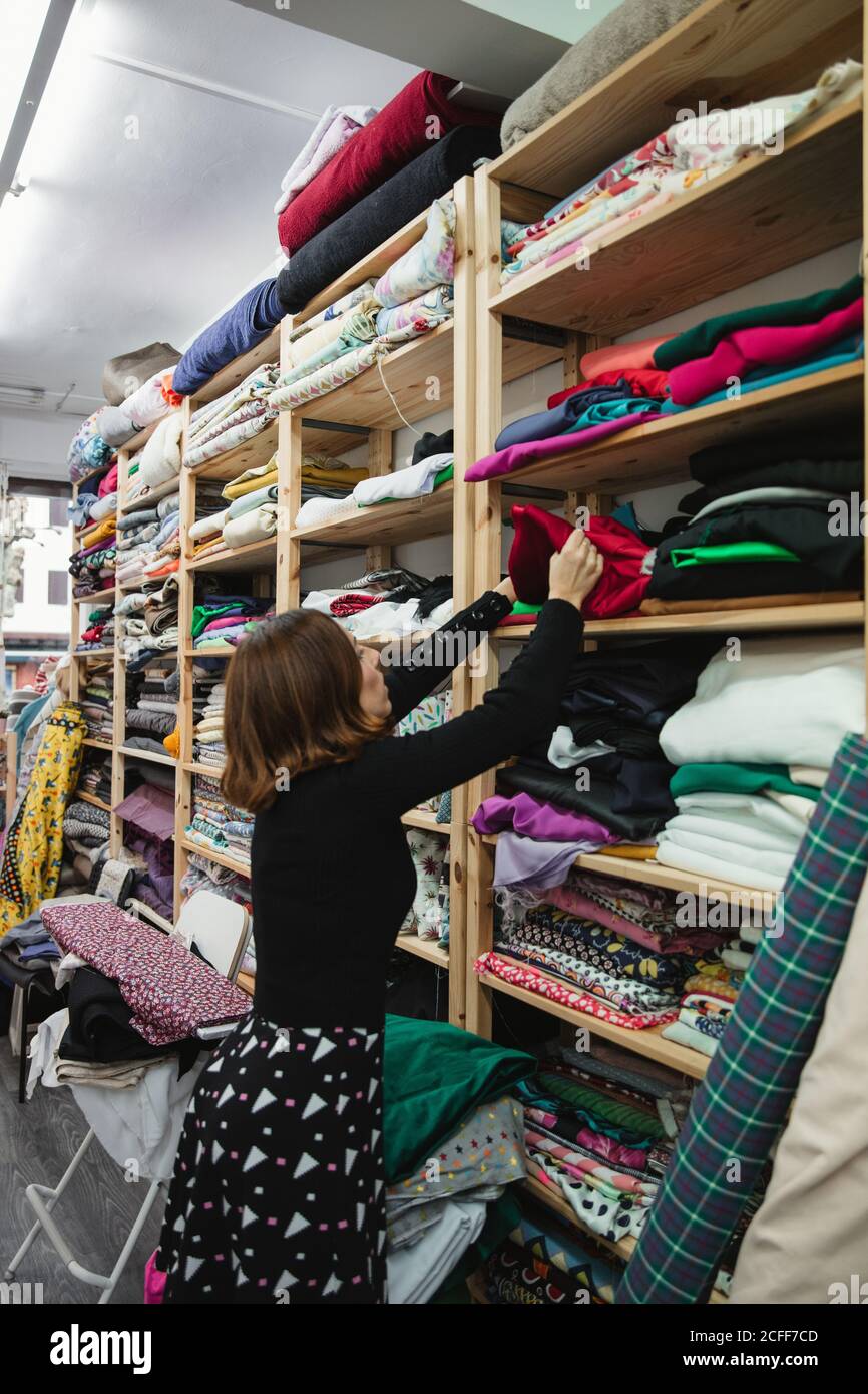 Rummaging hi-res stock photography and images - Alamy