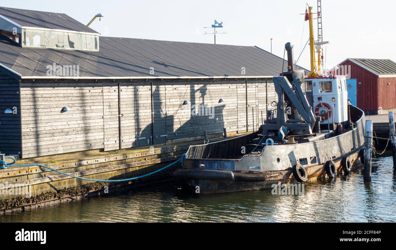 Working ship in Denmark Stock Photo - Alamy