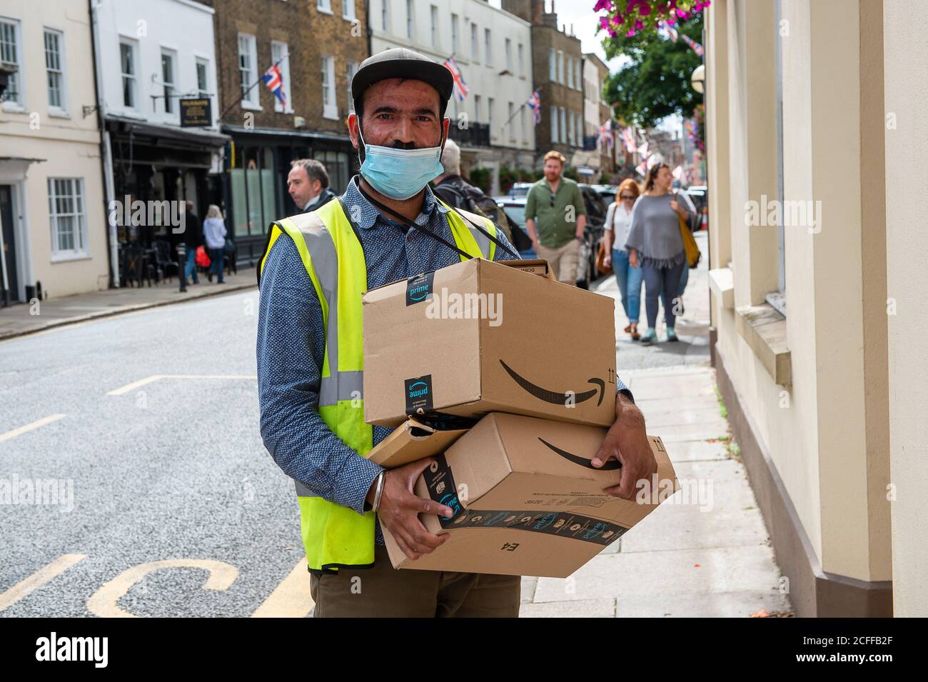 Amazon delivery man hi-res stock photography and images - Alamy
