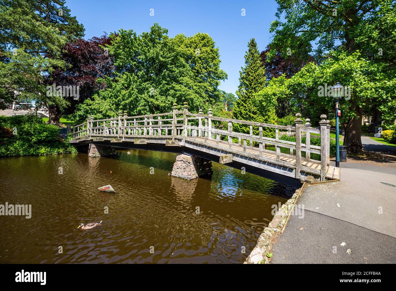 The bridge over the Swan Pool in Priory Park, Great Malvern ...