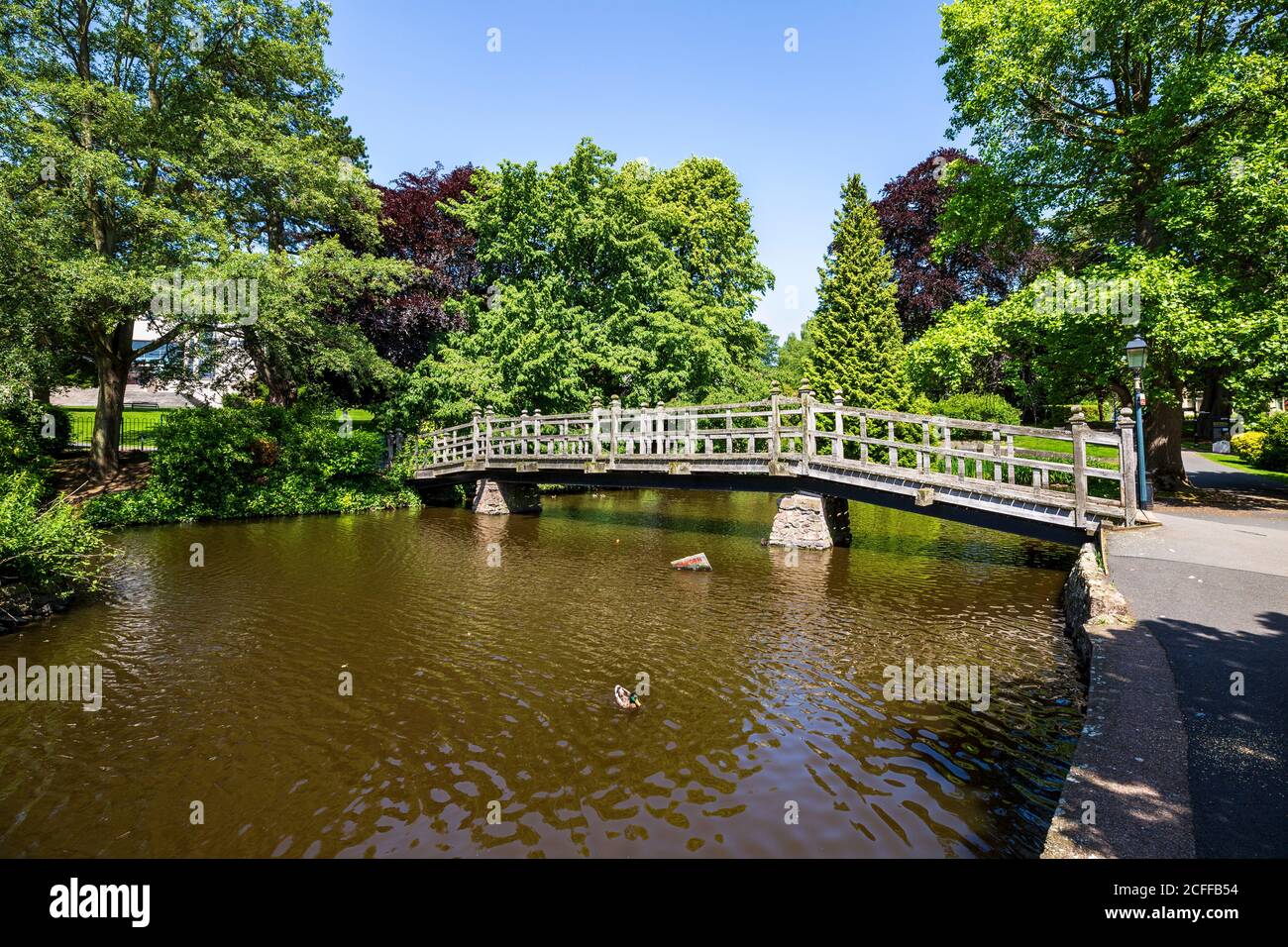 The bridge over the Swan Pool in Priory Park, Great Malvern ...