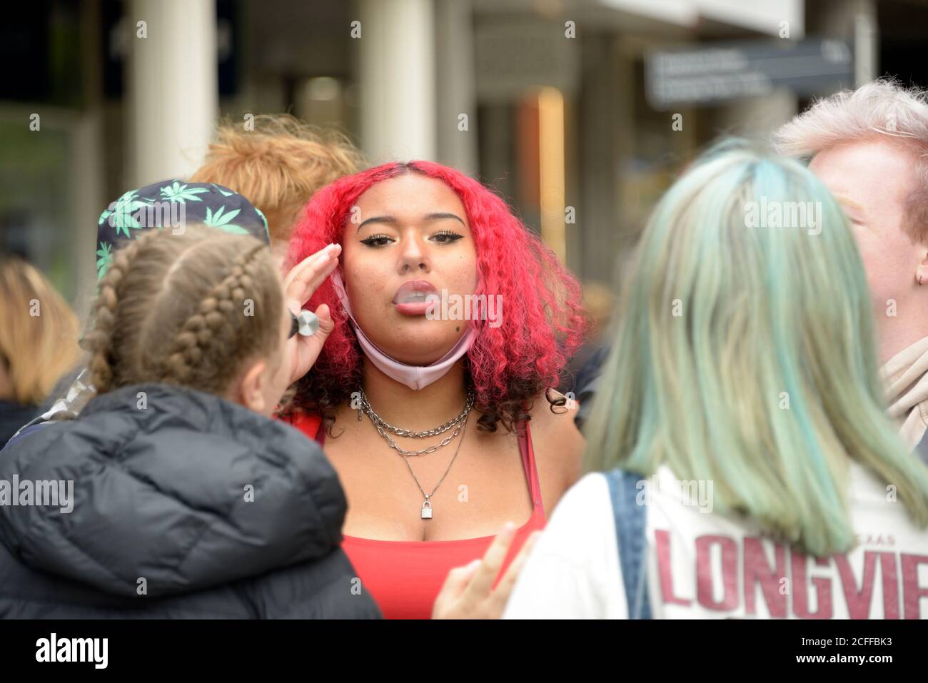 Young women vaping, at Socialist protest Stock Photo - Alamy