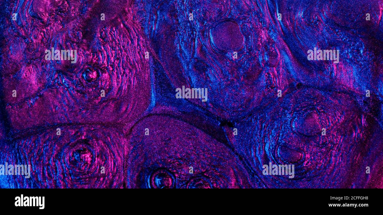 Ferrofluid illuminated with neon light Stock Photo - Alamy