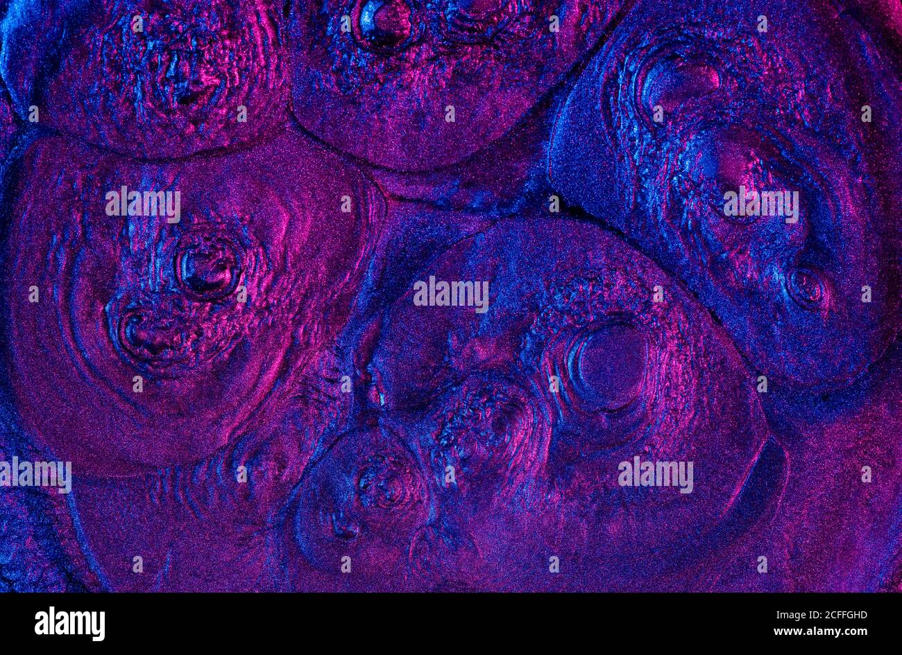 Ferrofluid illuminated with neon light Stock Photo - Alamy