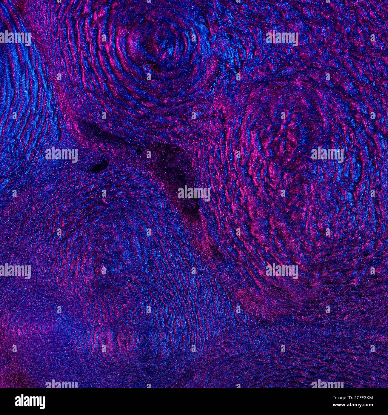 Ferrofluid illuminated with neon light Stock Photo - Alamy