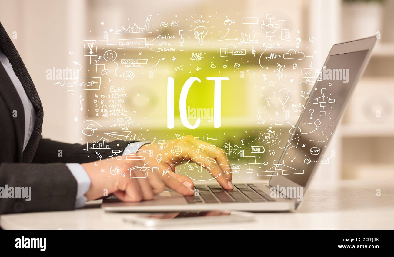 hand working on new modern computer with ICT abbreviation, modern ...