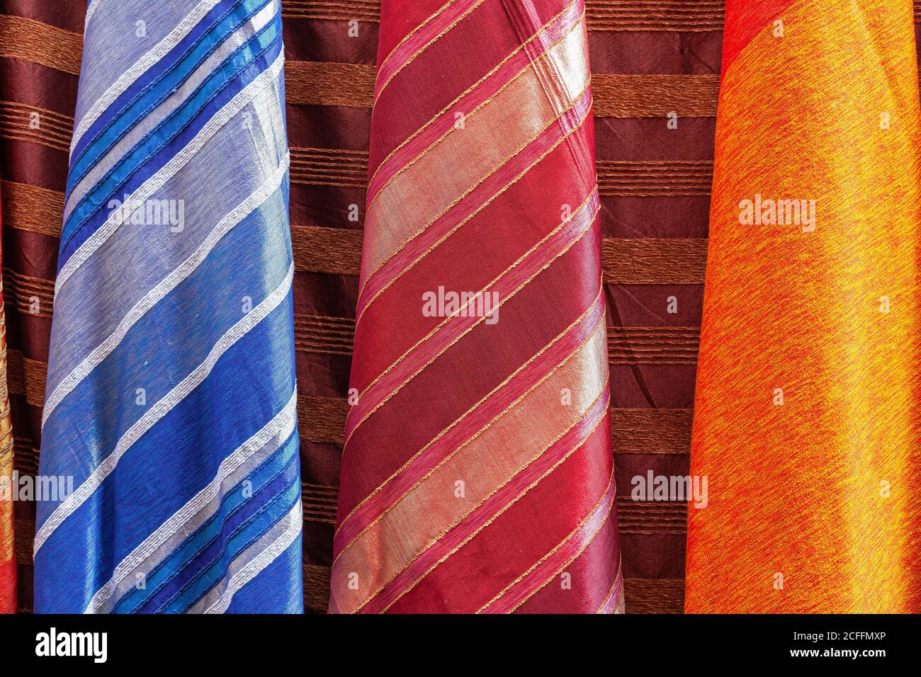 Selection of colourful cloth at a market stall in Fez, Morocco Stock ...