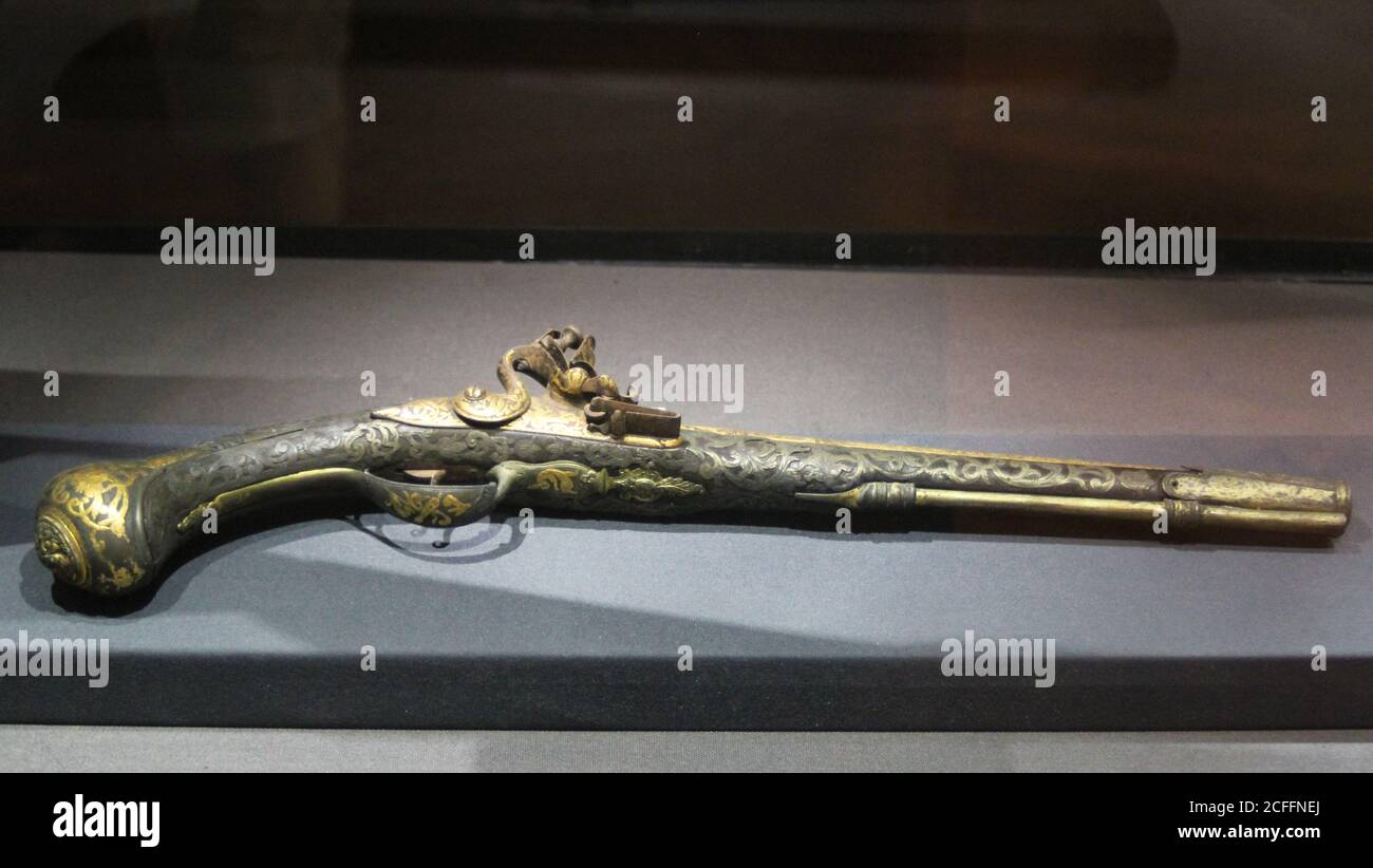 Ornate powder and shot pistol Stock Photo - Alamy