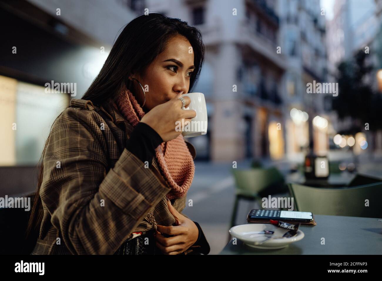 Woman sipping drink hi-res stock photography and images - Alamy