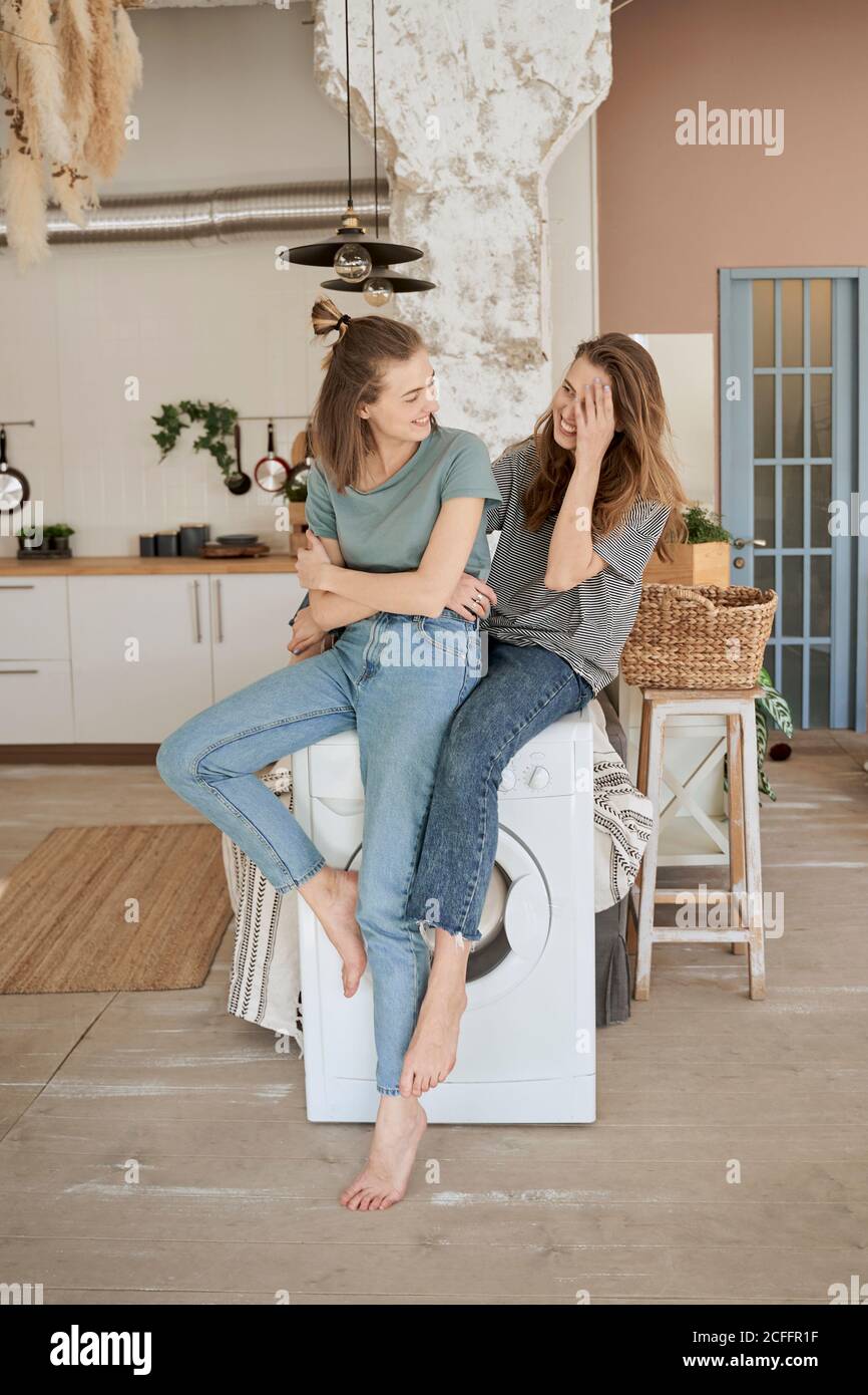 Sitting on the washing machine hi-res stock photography and images - Alamy