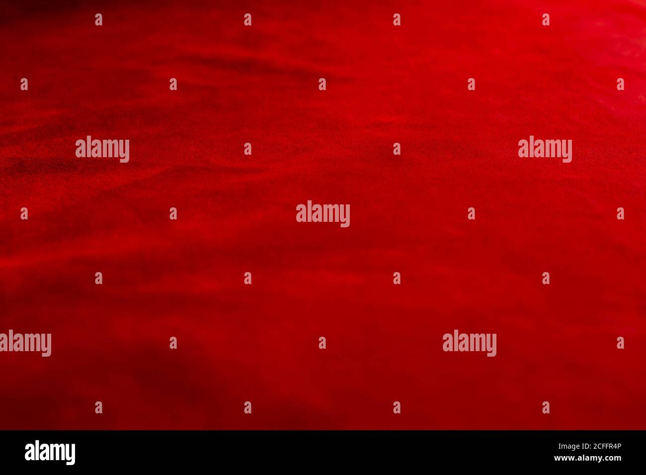 Dark red matte background of suede fabric, closeup. Velvet texture of ...