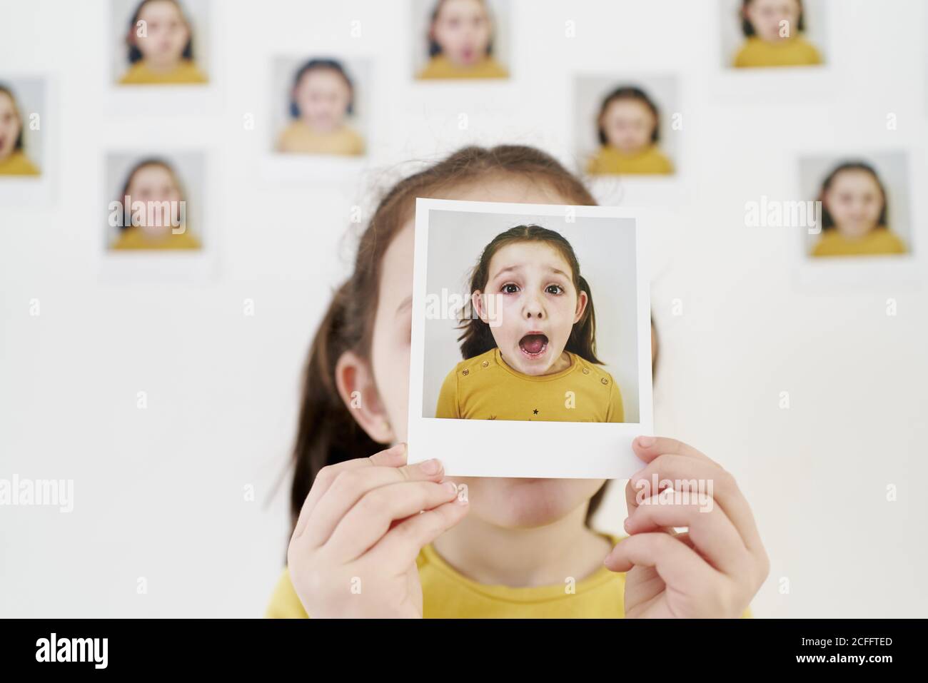 Hide behind white wall hi-res stock photography and images - Alamy