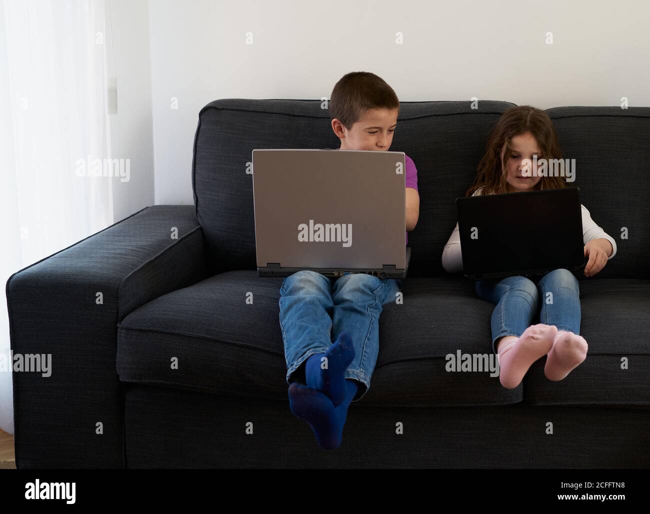 Using laptops hi-res stock photography and images - Alamy