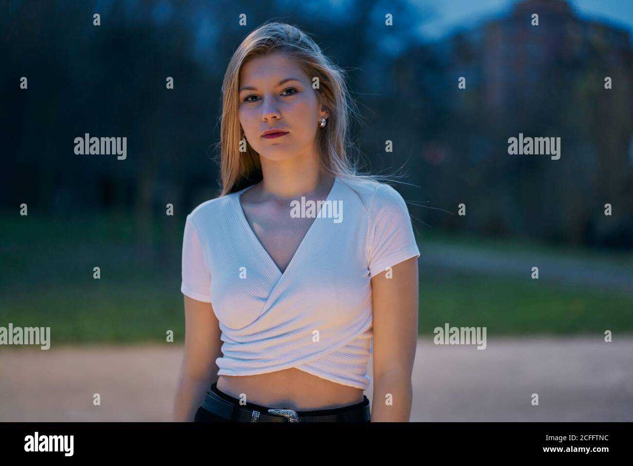 Woman dim light hi-res stock photography and images - Alamy