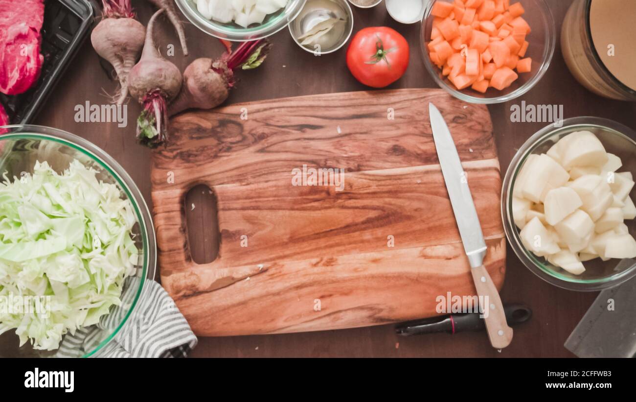 Step by step. Flat lay. Preparing ingredients to cook beet soup ...