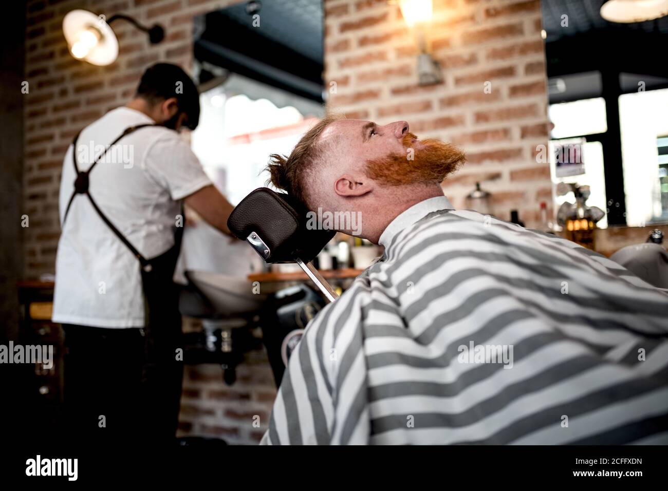 Barber waiting customer hi-res stock photography and images - Alamy