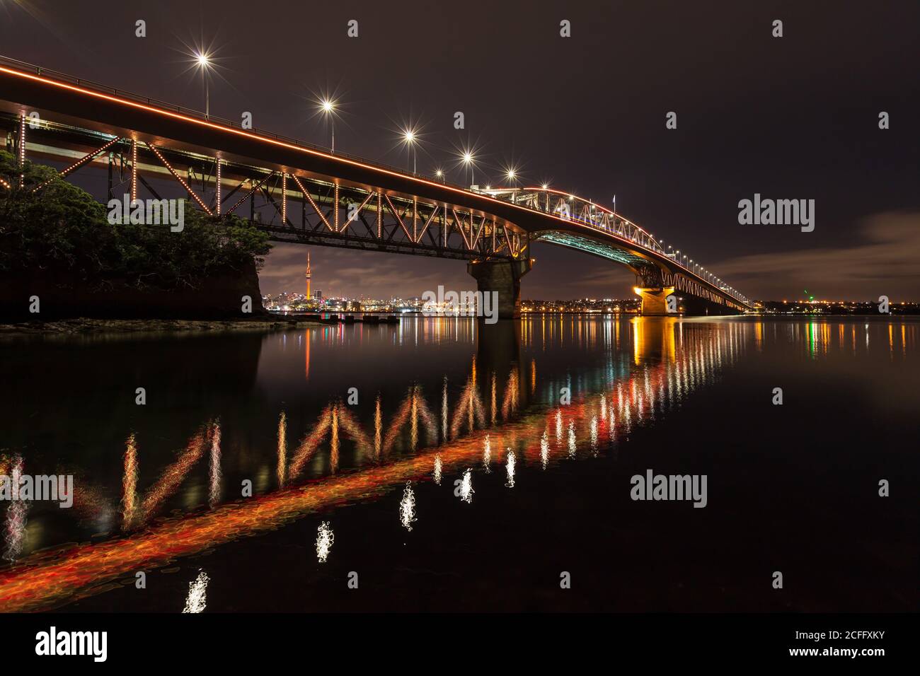 The Auckland Harbour Bridge, Auckland, New Zealand, lit up at night ...