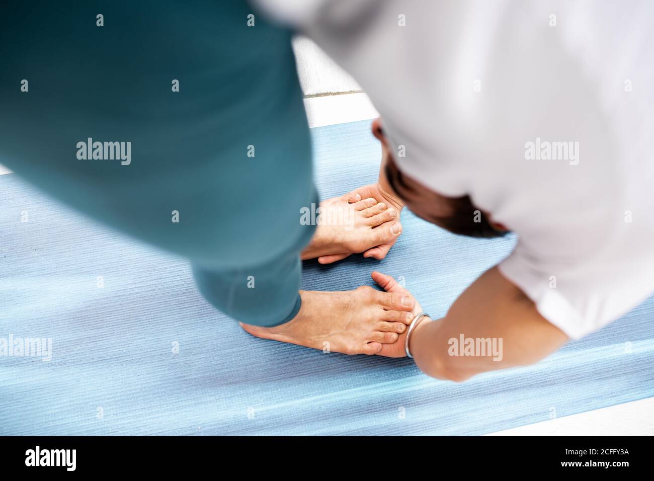 Bending forward hi-res stock photography and images - Alamy