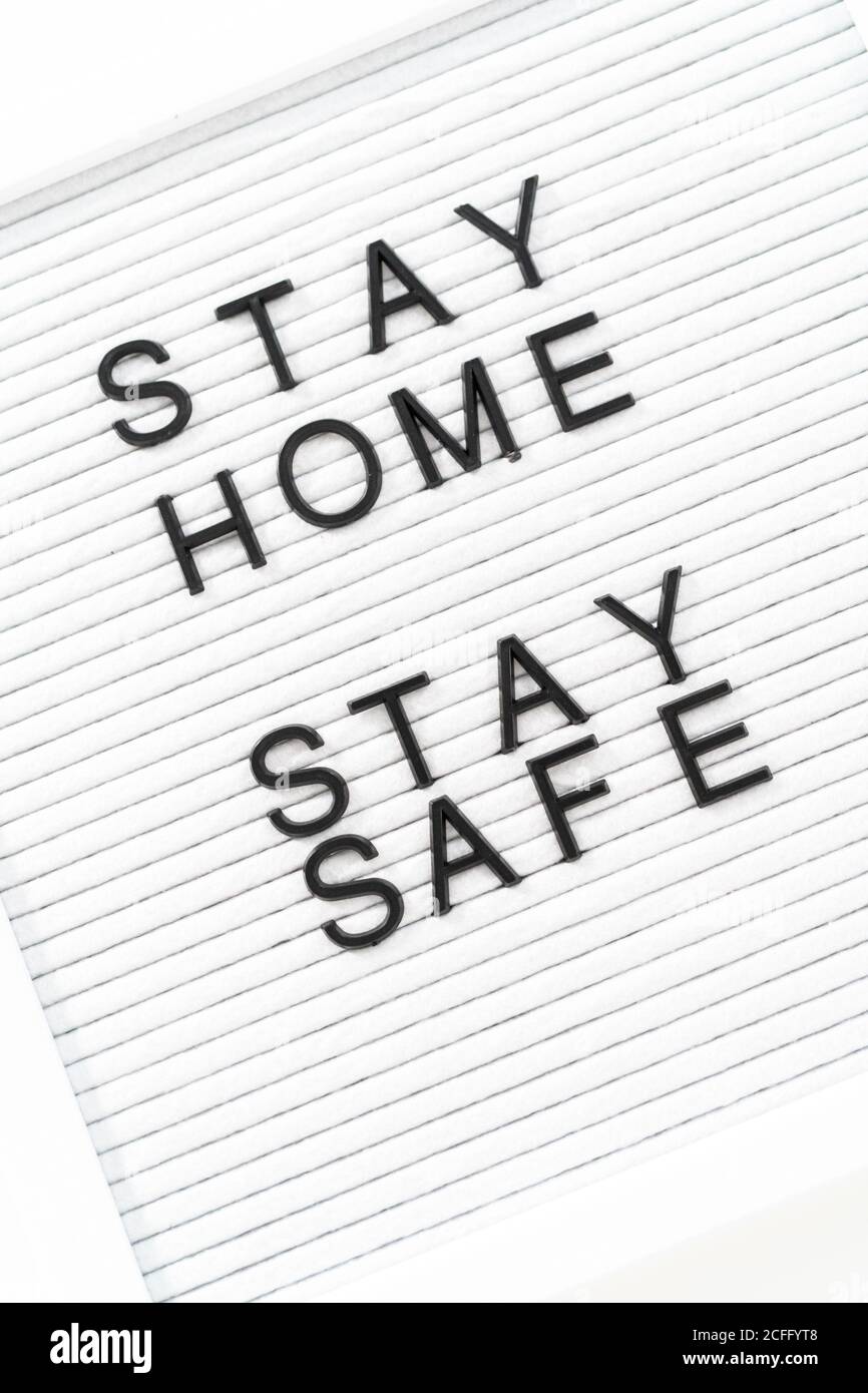 STAY HOME and STAY SAFE sign on message board Stock Photo - Alamy