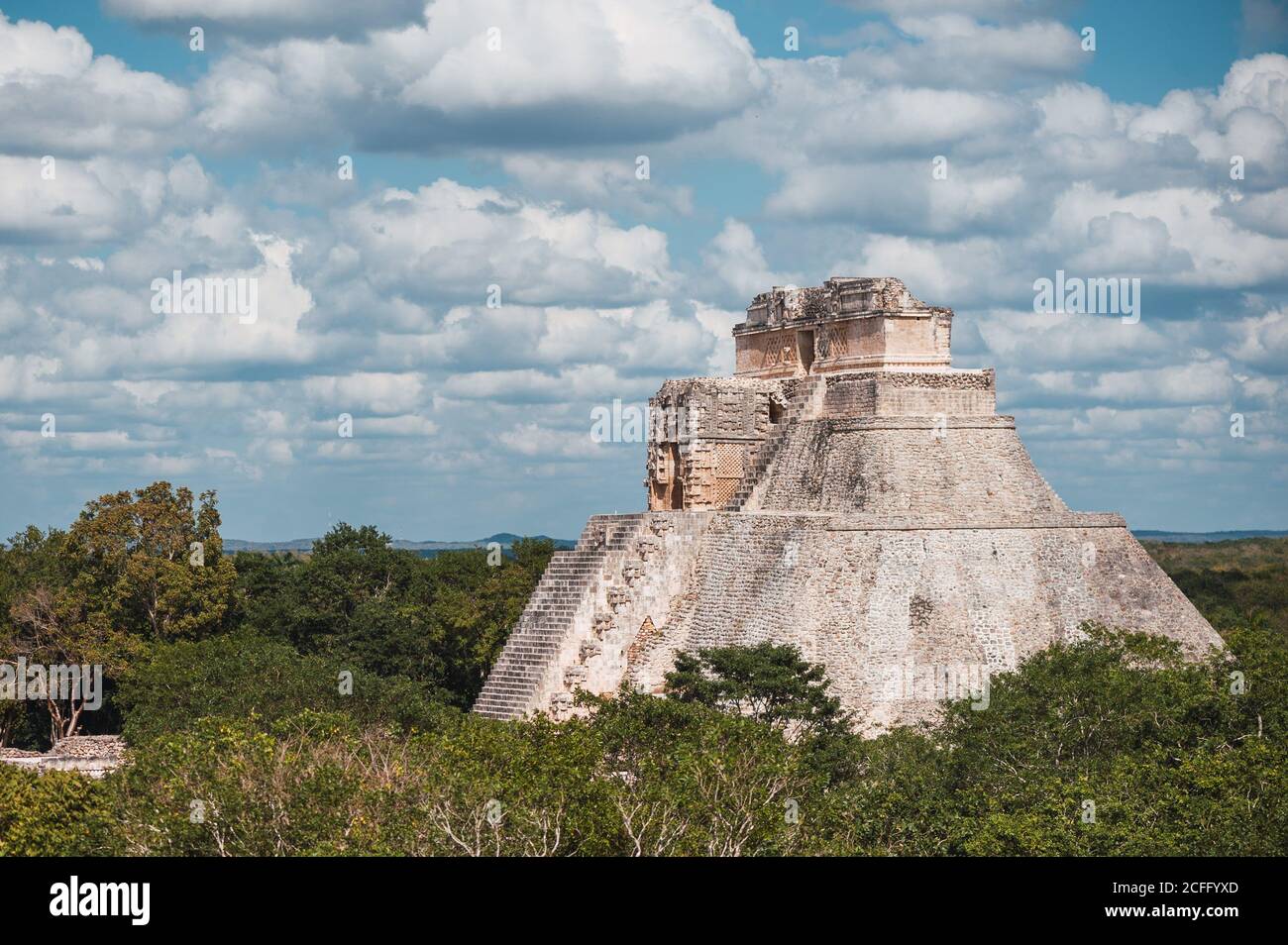 Exterior of stone steps of El Castillo with view of pyramid under ...