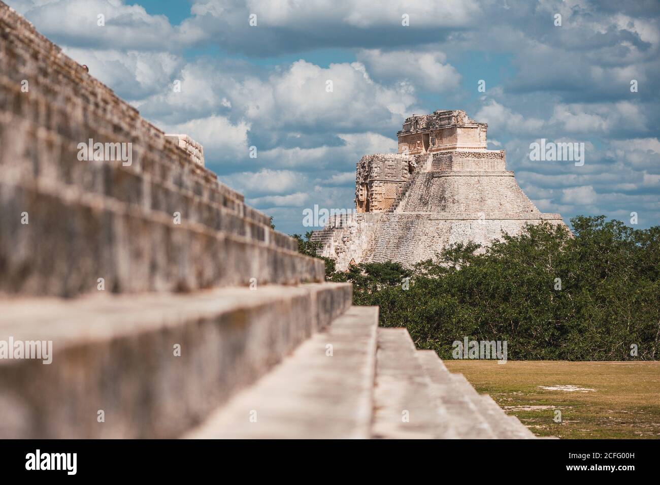 Exterior of stone steps of El Castillo with view of pyramid under ...