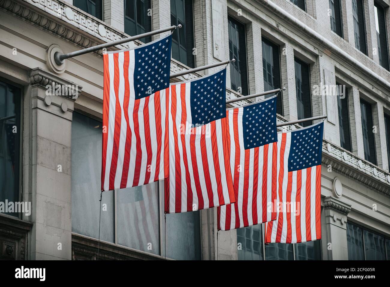 American flag hanging from building hi-res stock photography and images ...