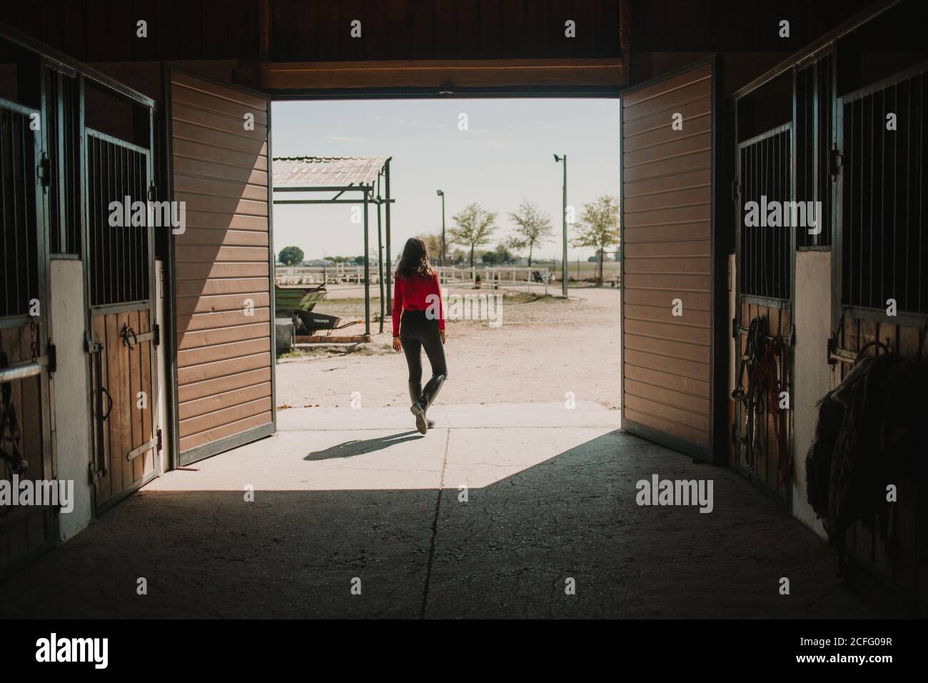 Woman Walking Out Of Door High Resolution Stock Photography and Images ...