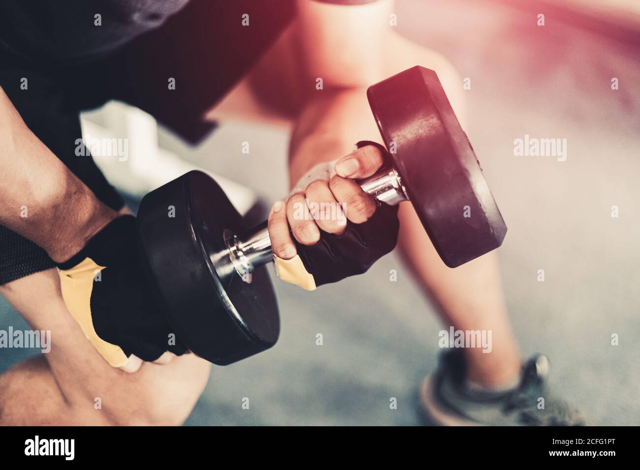 Dumbbell man young sport workout hi-res stock photography and images ...
