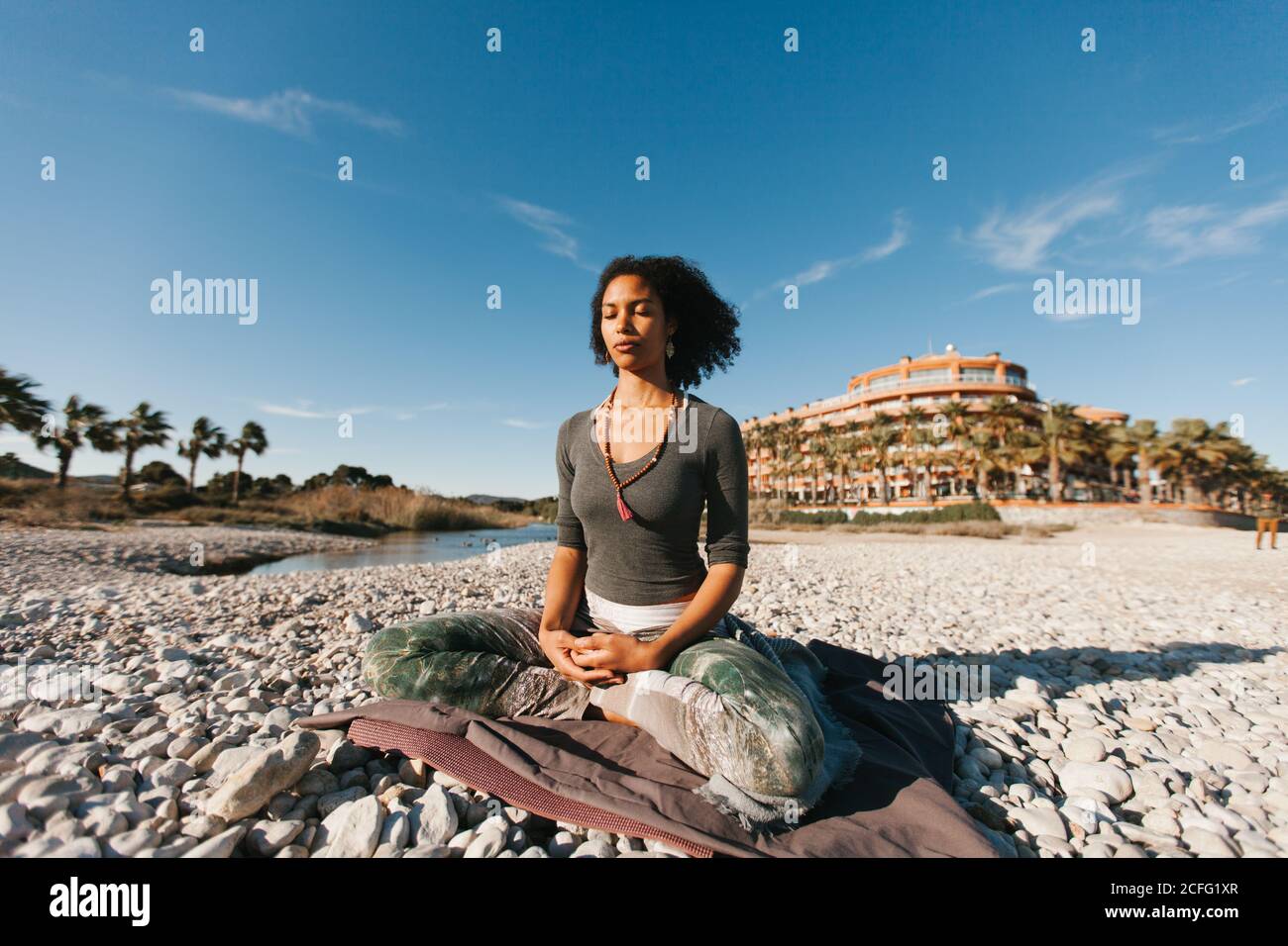 Woman praying beach hi-res stock photography and images - Alamy