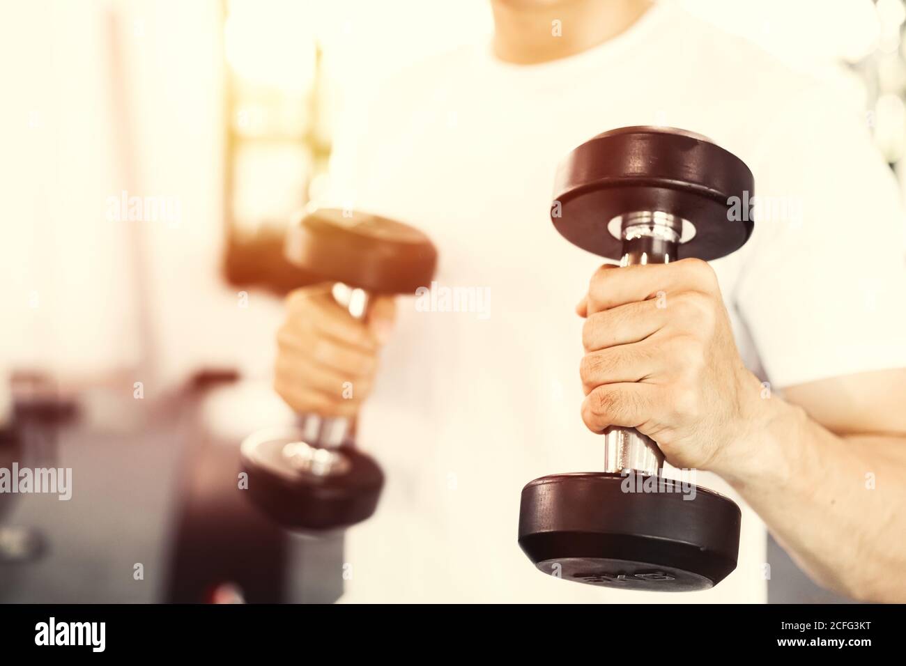 Dumbbell instrument exercise in hi-res stock photography and images - Alamy