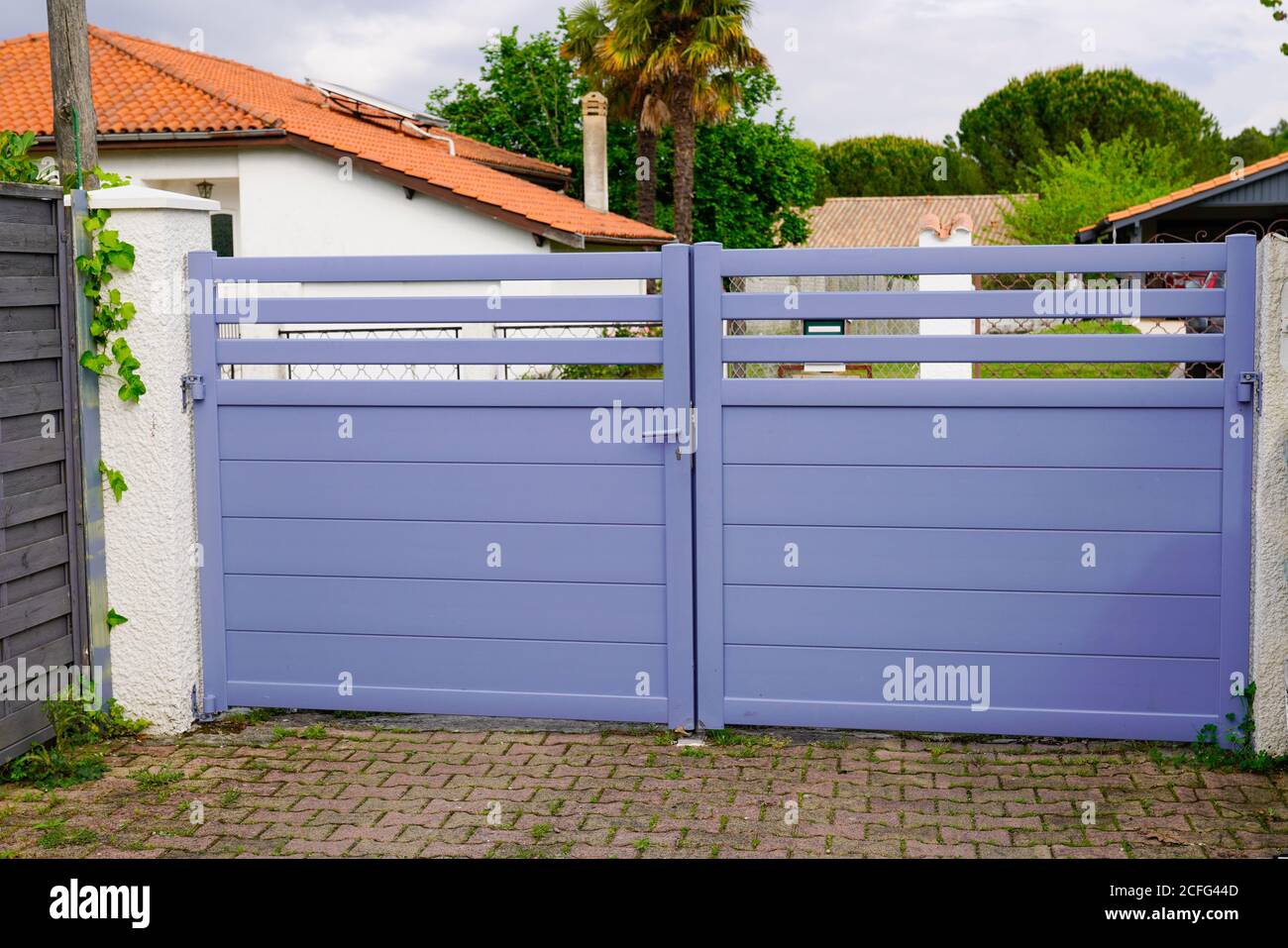 modern grey gate aluminum portal with blades suburbs house street Stock ...